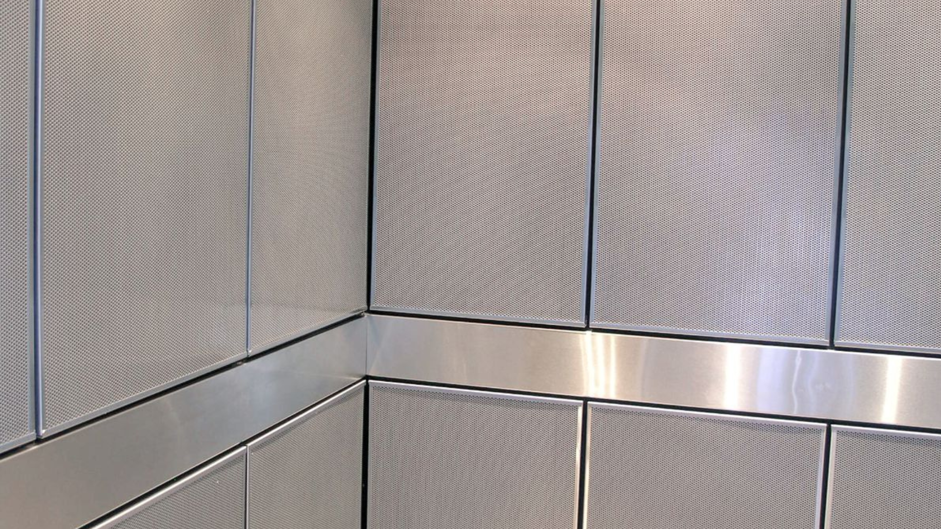 Vinyl Film vs Laminate for Elevator Panels